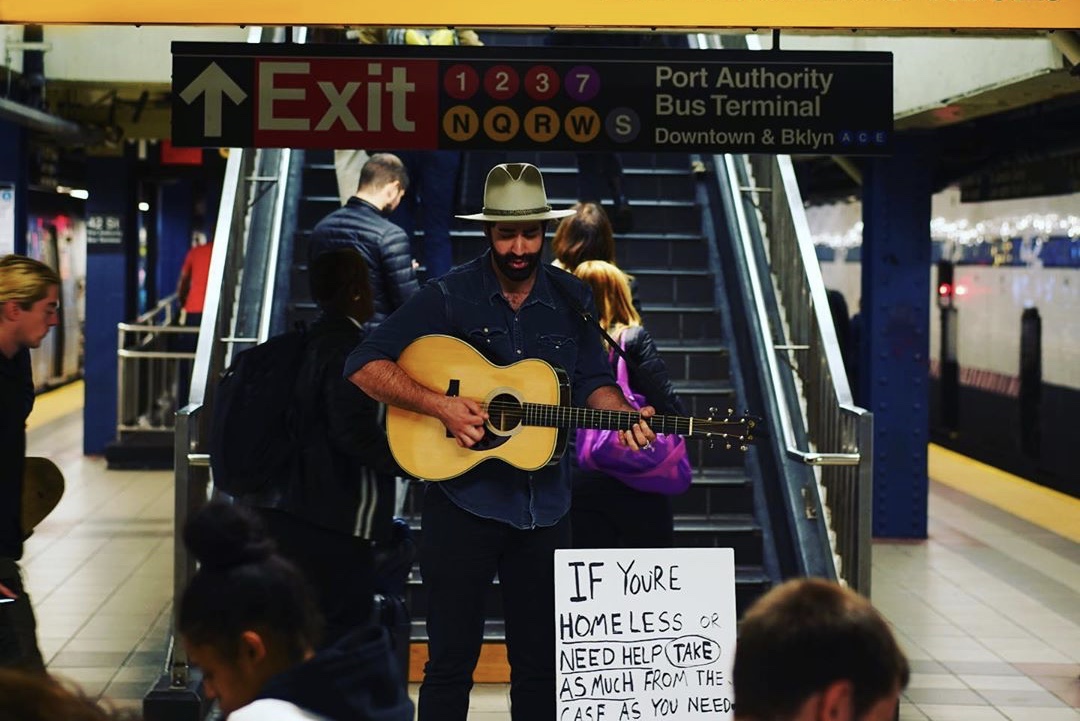 Why this busker encourages people to take money from his collection ...